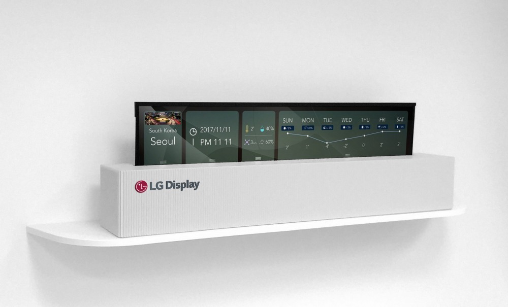 CES 2018: LG Reveals 65" Rollable TV That's as Portable as a Laptop ...